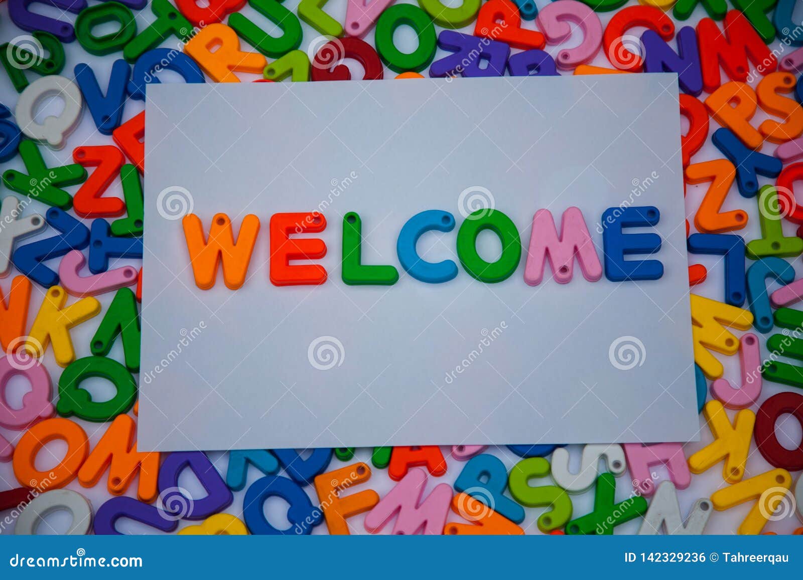 Welcome Written with Alphabet Blocks on a Paper Stock Photo - Image of ...