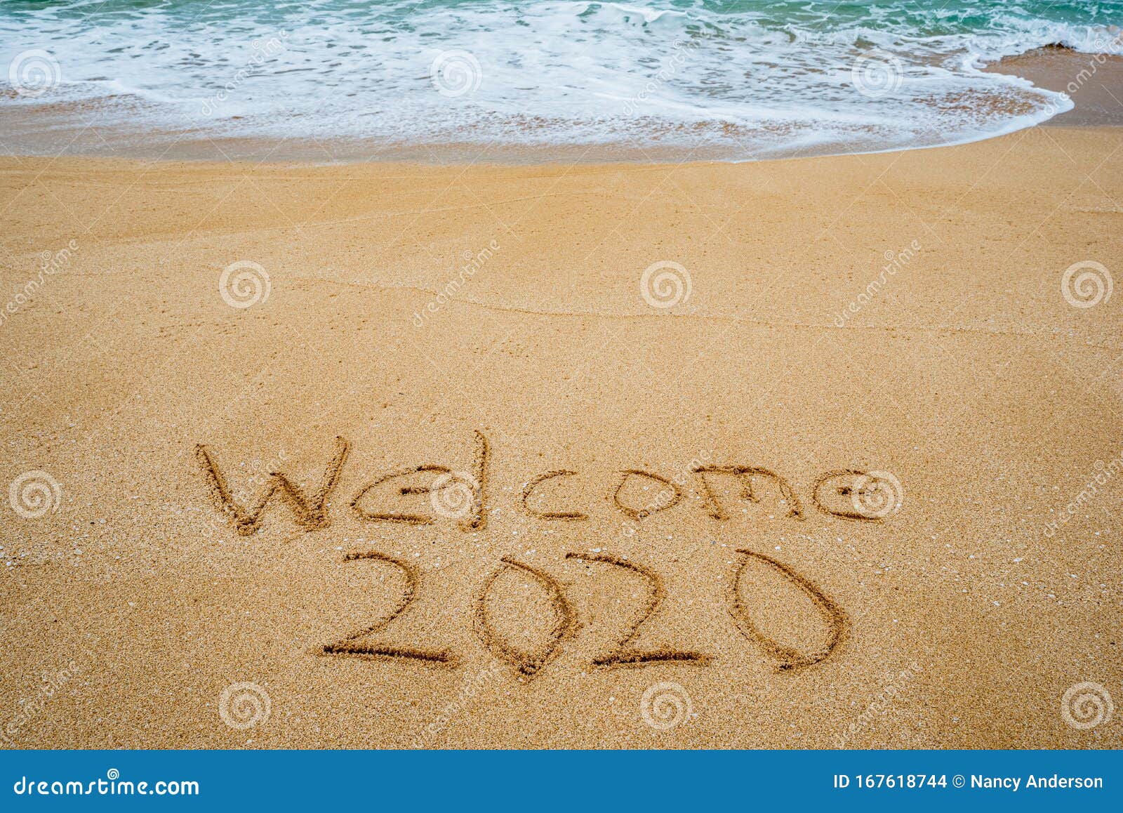 Welcome 2020 Written in the Sand Stock Photo - Image of printed, sandy ...