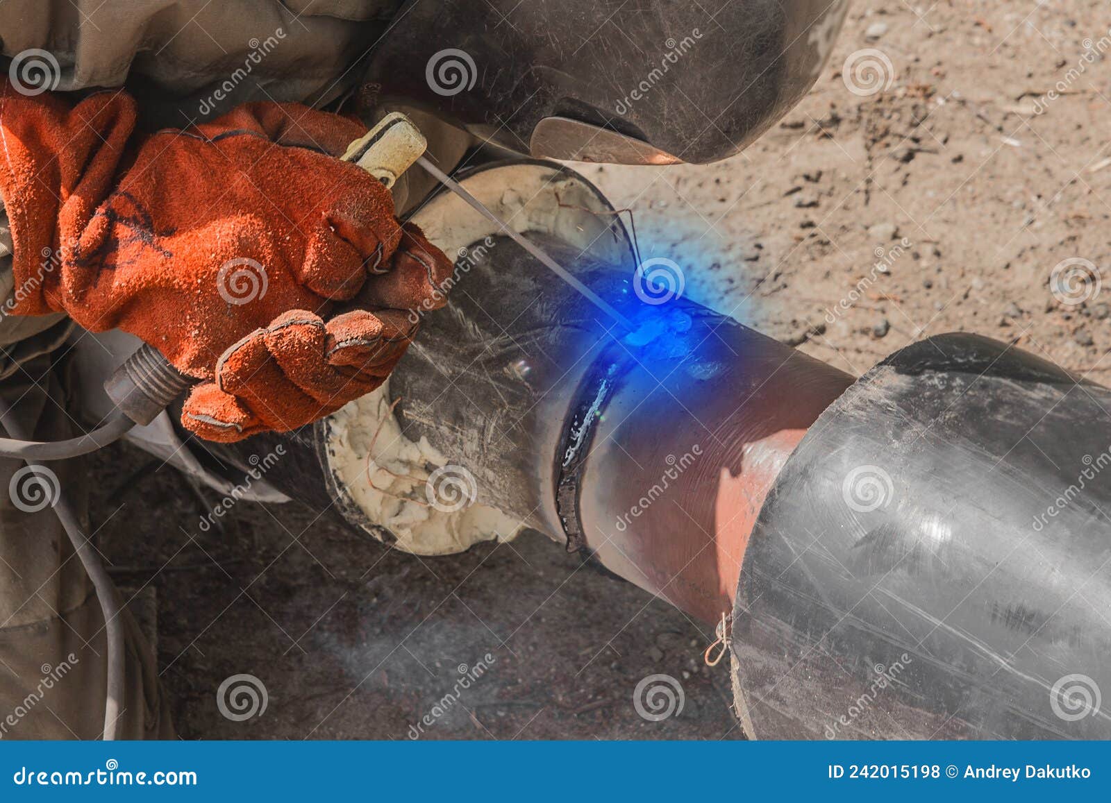 A Welder is Engaged in Welding Work on the Polyethylene Pipe of the ...