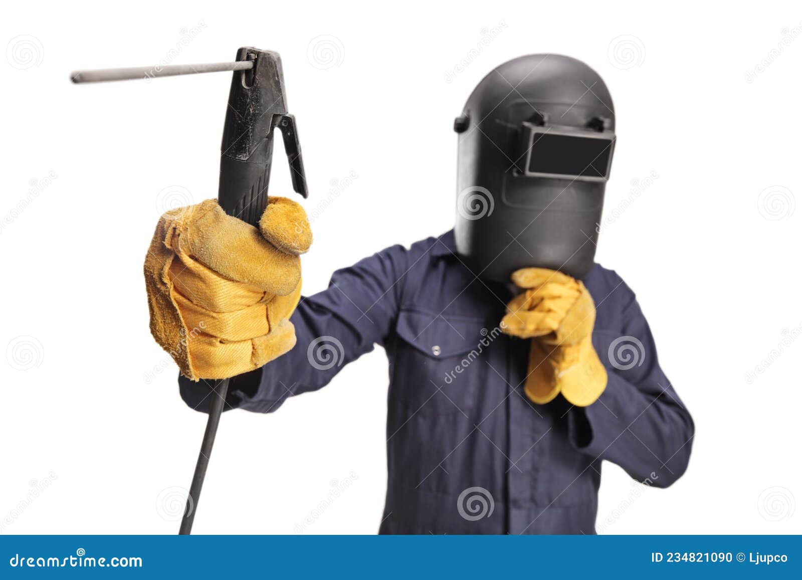 Welder with a Face Shield Using a Welding Machine Stock Photo - Image ...