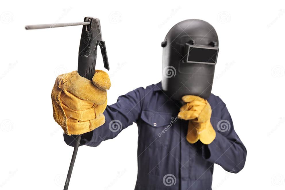 Welder with a Face Shield Using a Welding Machine Stock Photo - Image ...