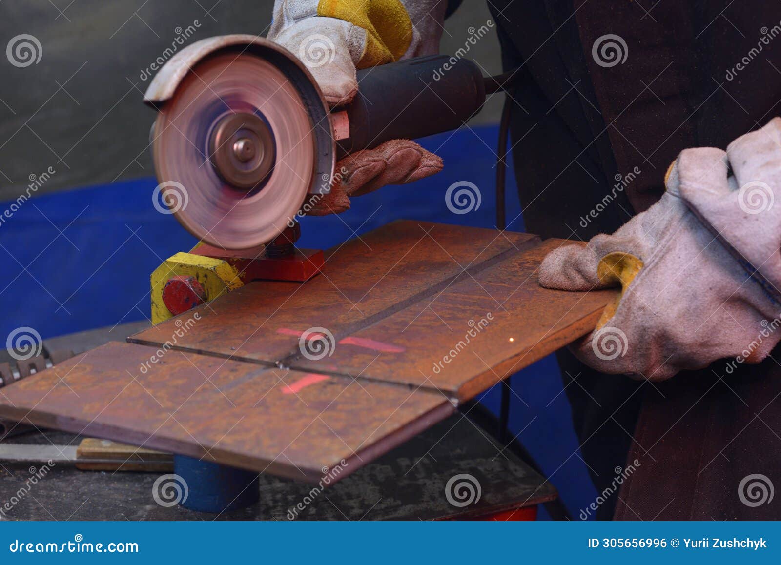 Welder Hands Grinding Metal Piece with a Grinder, Processing Weld after ...