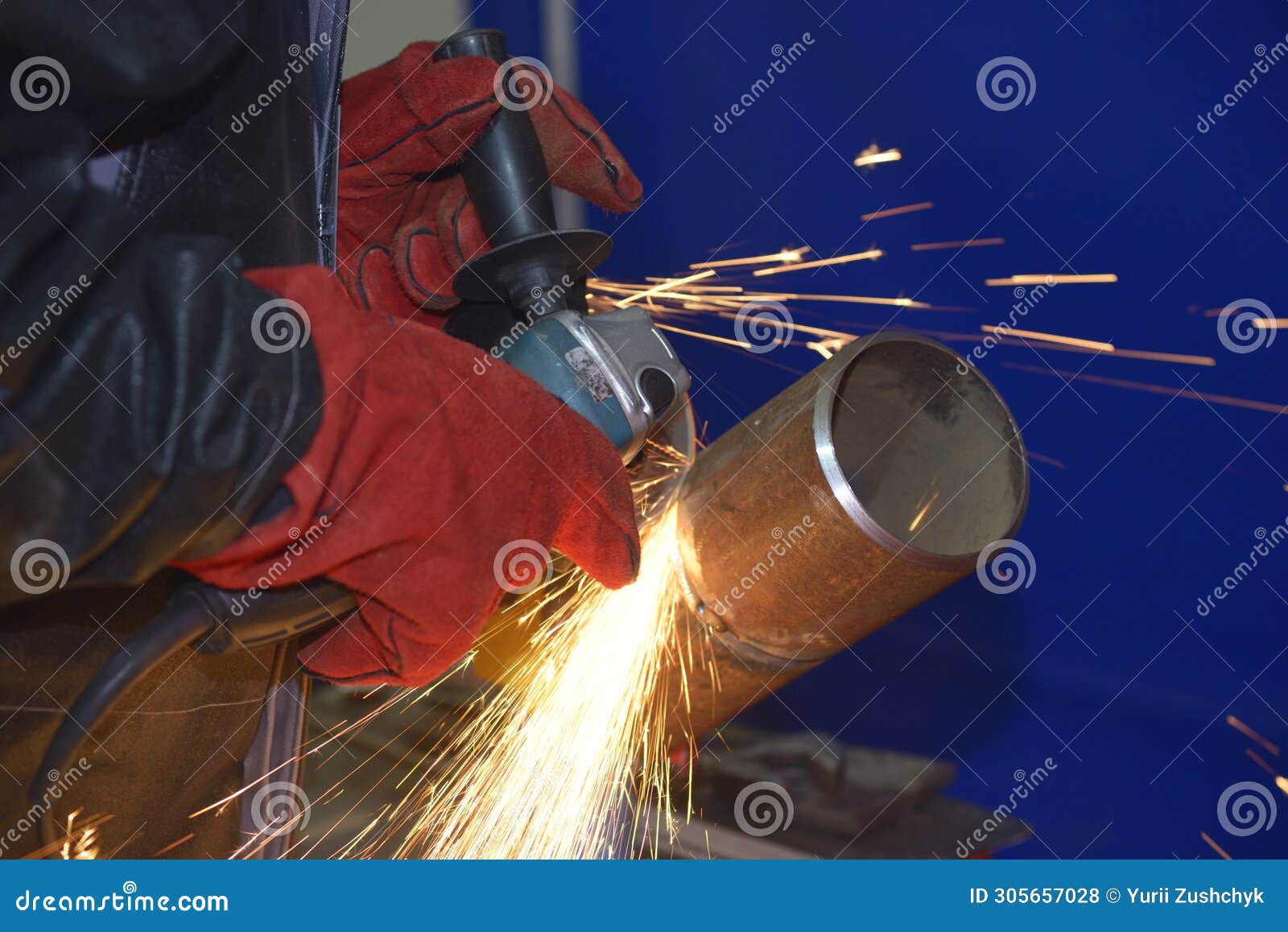 Welder Hands Grinding Metal Piece with a Grinder, Processing Weld after ...