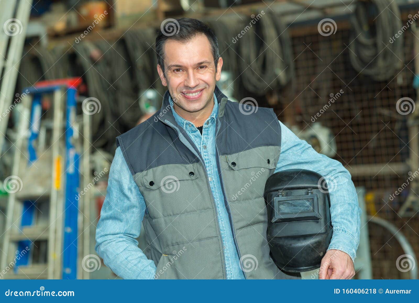 Welder Holding Welding Mask Posing Stock Photo - Image of flank, side ...