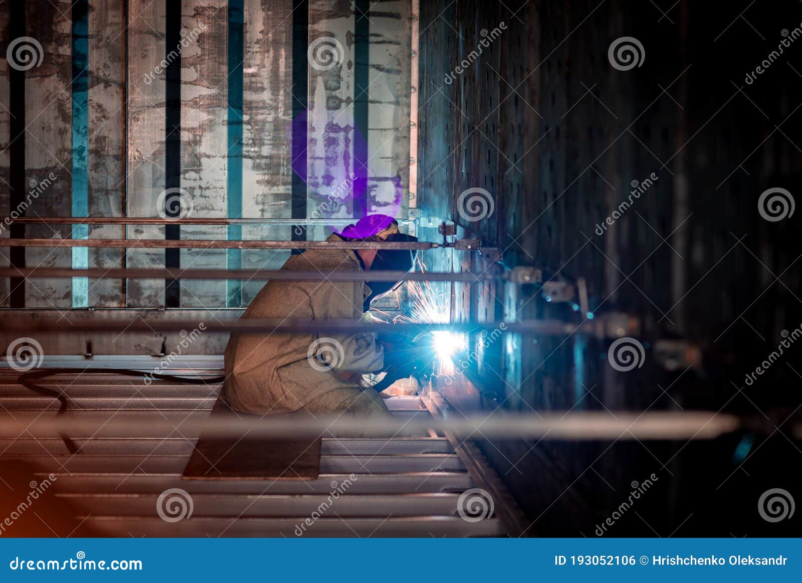 Welder Makes Welding Inside an Iron Container Stock Photo - Image of ...