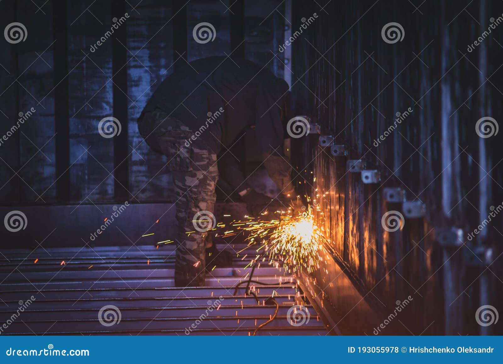 Welder Makes Welding Inside an Iron Container Stock Photo - Image of ...