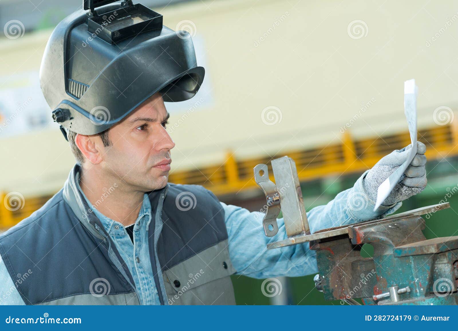 Welder Man Looking at Paper Stock Image - Image of safety, equipment ...