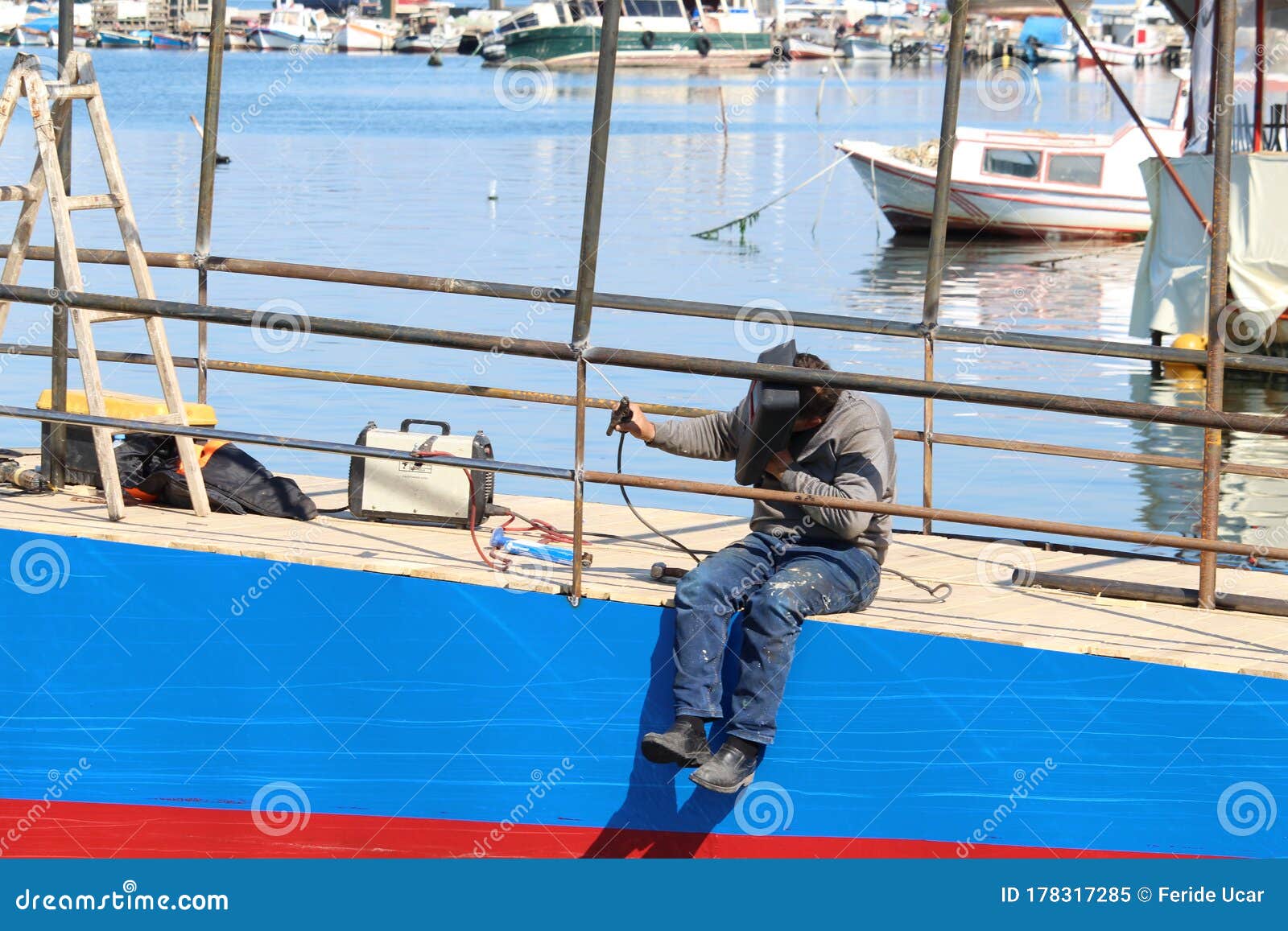 A Welder is Mending the Ship Stock Image - Image of business, protect ...