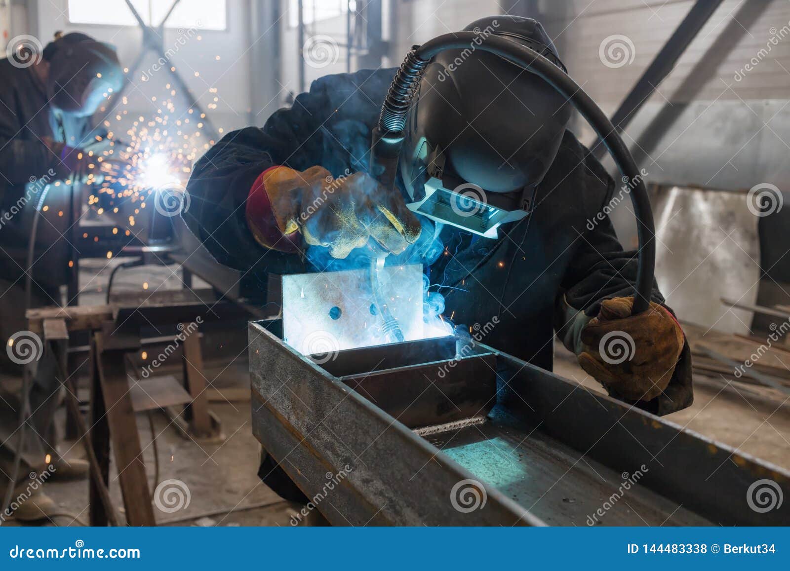 Welder Performs Welding Work of Metal Structures Stock Photo - Image of ...