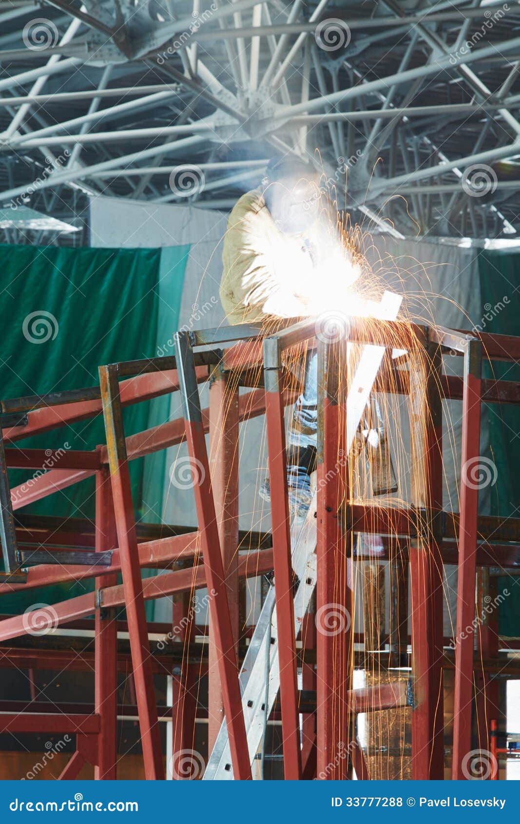 Welder in Protective Suit Welds Steel Frame Stock Photo - Image of ...
