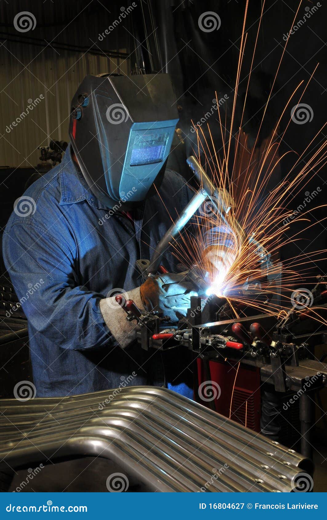 The Welder Is Welding With Shielded Metal Arc Welding SMAW Or Manual ...