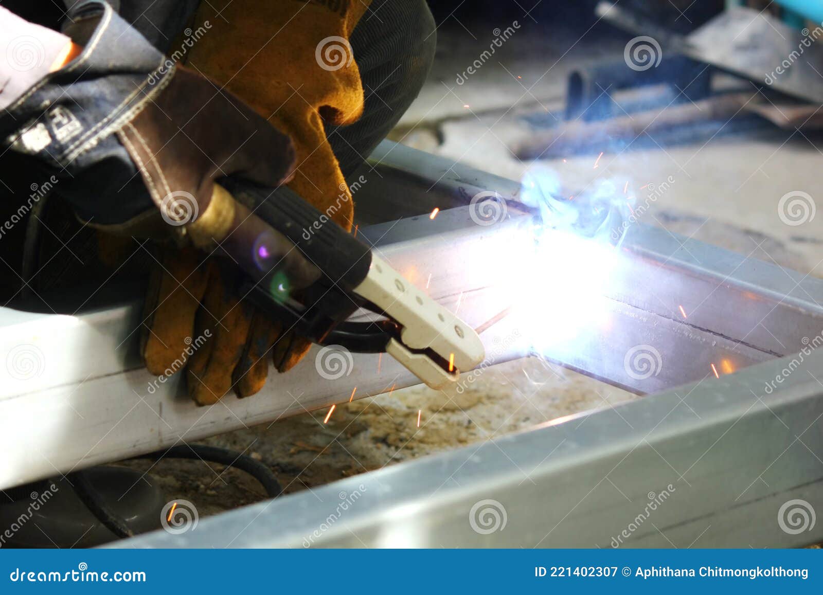 The Welder Welding Steel in Construction Site . the Steel Worker Using ...