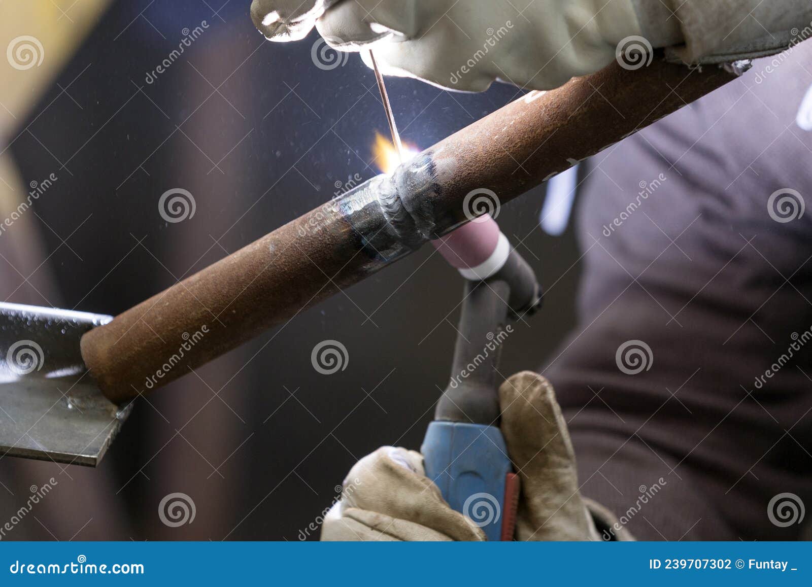 The Welder is Welding To Pipe for Welder Qualification with Gas ...