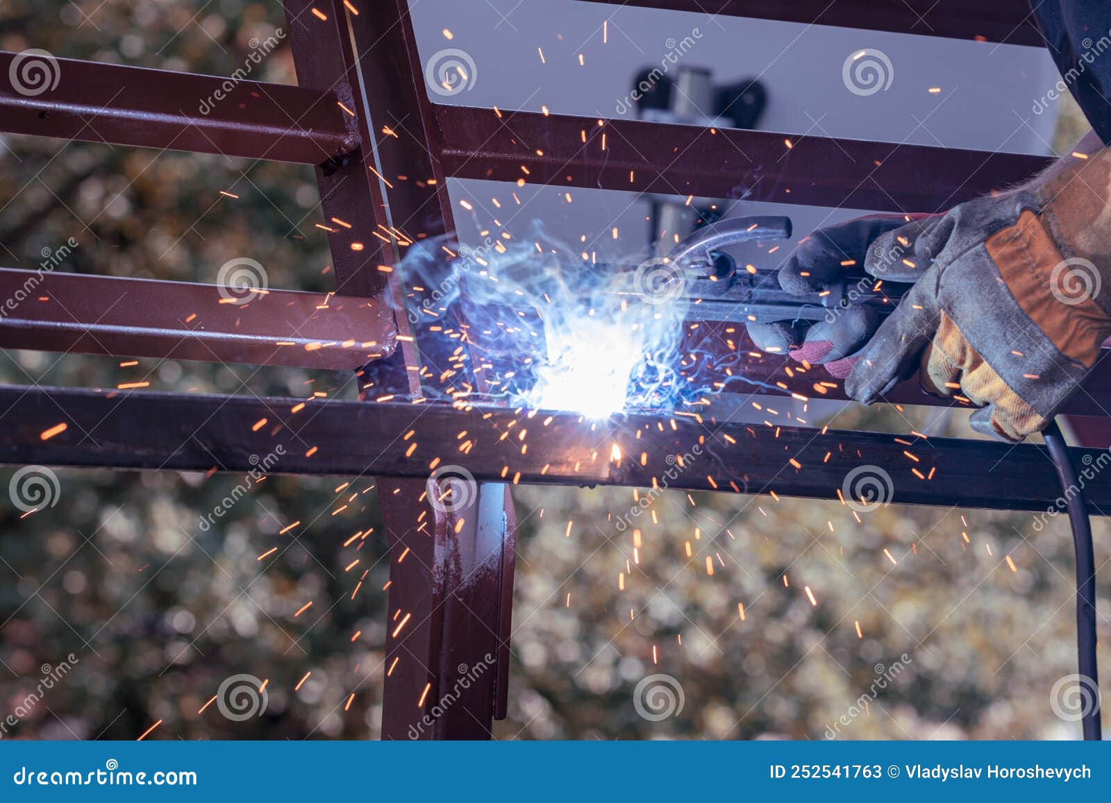 Welder Welds Metal by Arc Welding, Welding of Metal Structures Stock ...