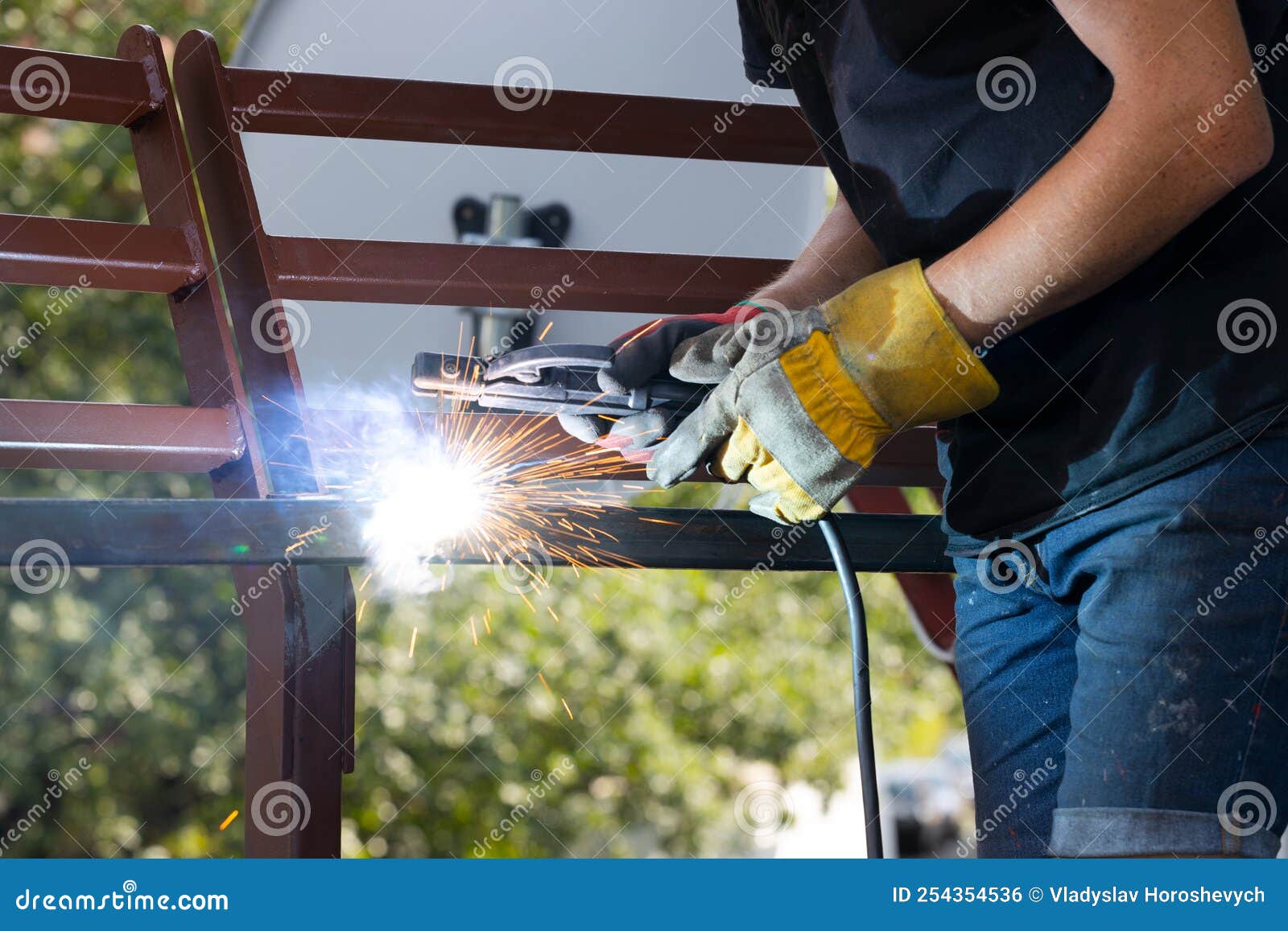 Welder Welds Metal by Arc Welding, Welding of Metal Structures Stock ...