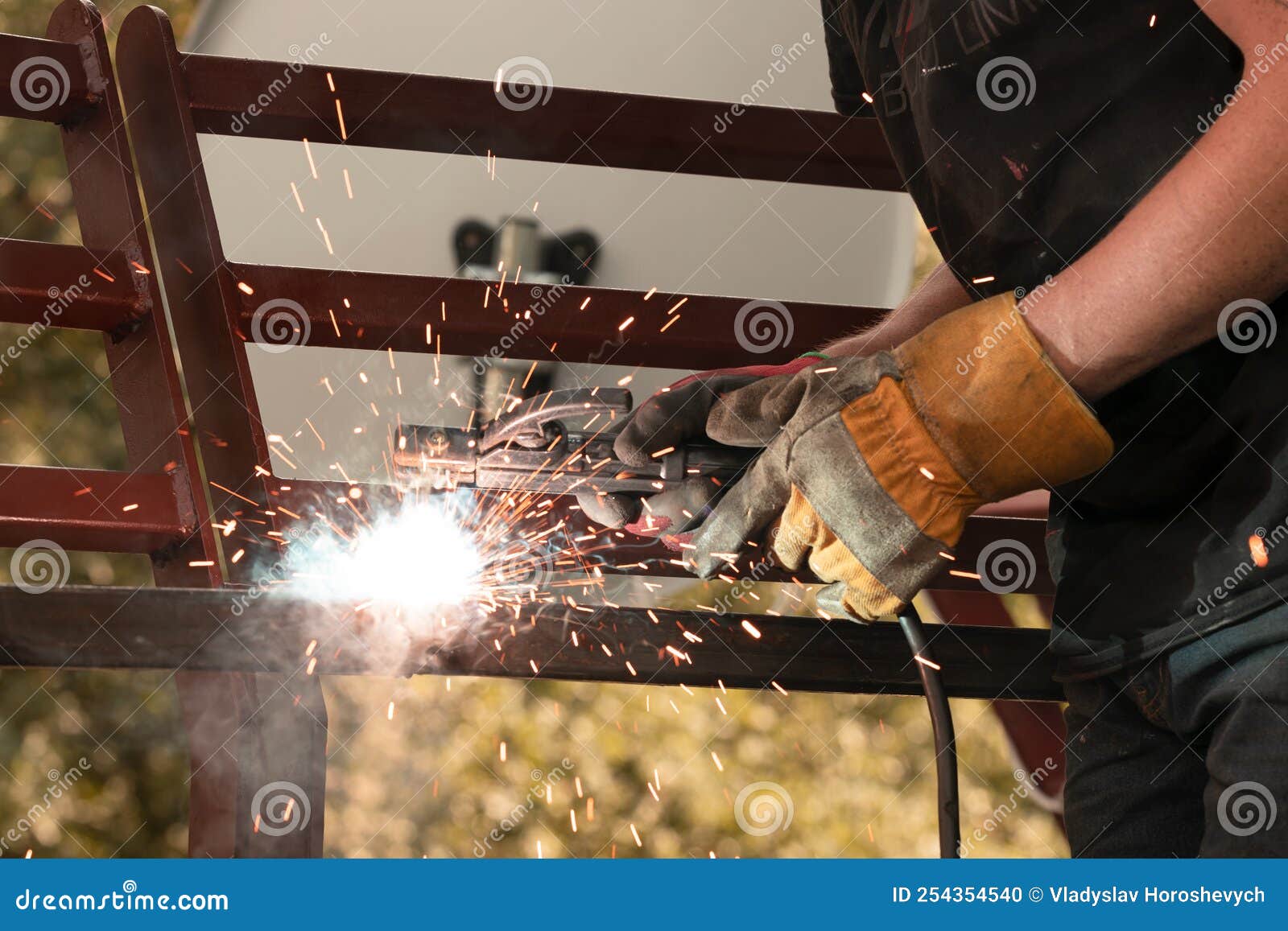 Welder Welds Metal by Arc Welding, Welding of Metal Structures Stock ...