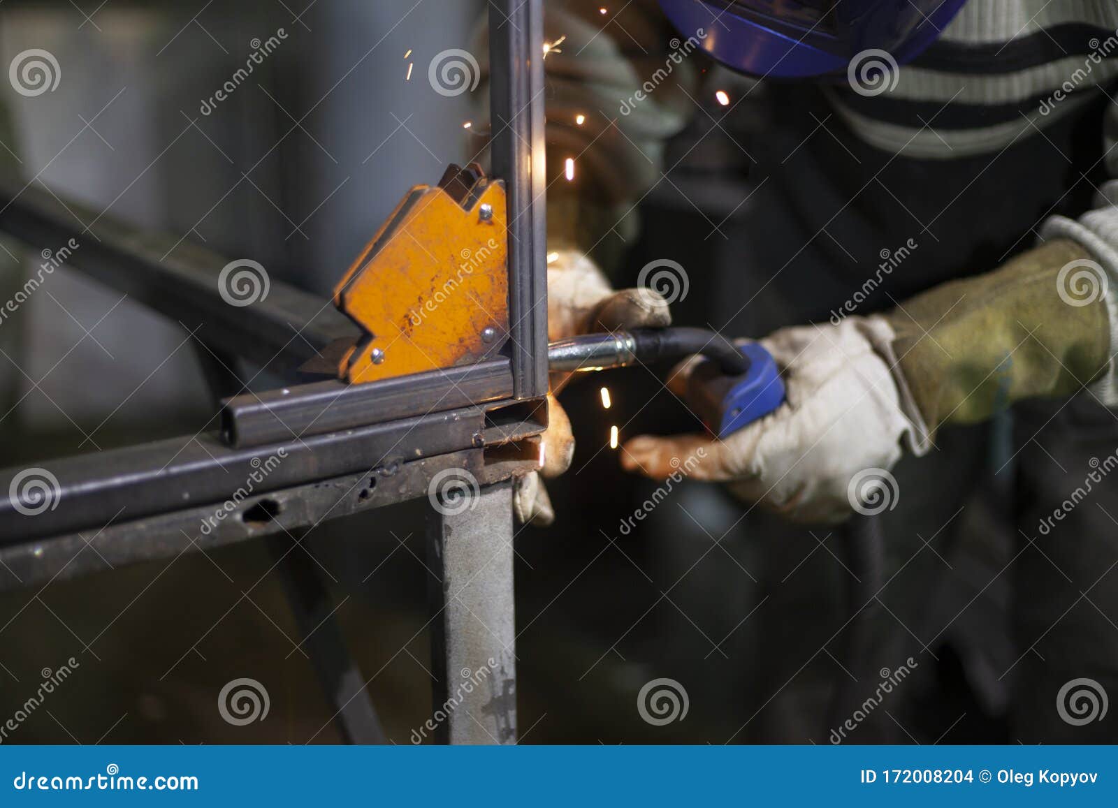 Welder at Work. the Welder Heats the Metal. Classes in the Workshop ...