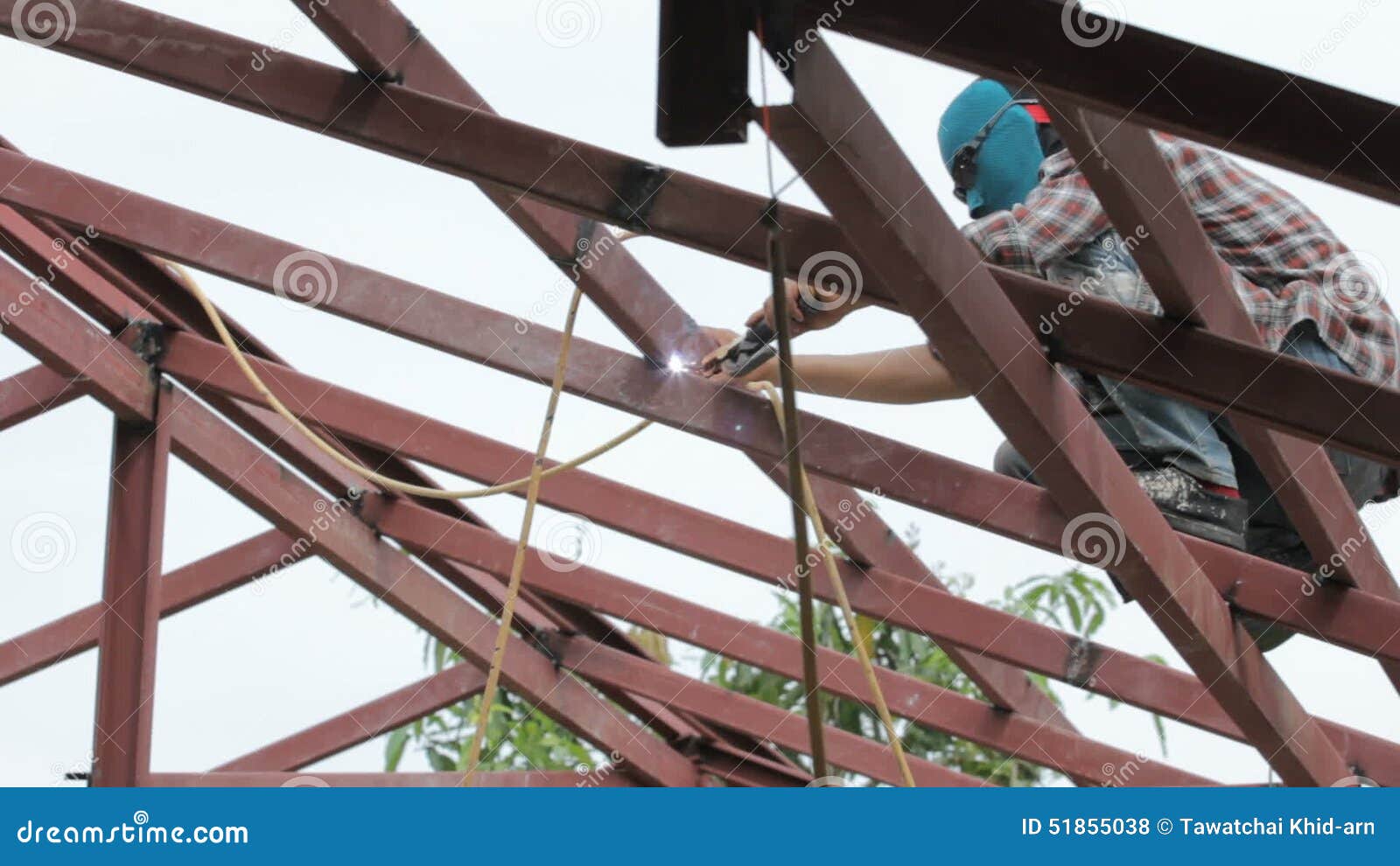 Welder at work on the roof stock footage. Video of conditions - 51855038