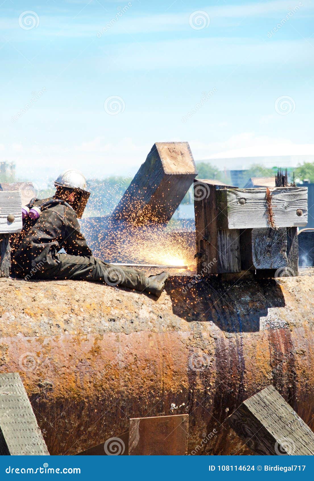 Welder at Work. Welder Using Cutting Torch for Demolition Project ...