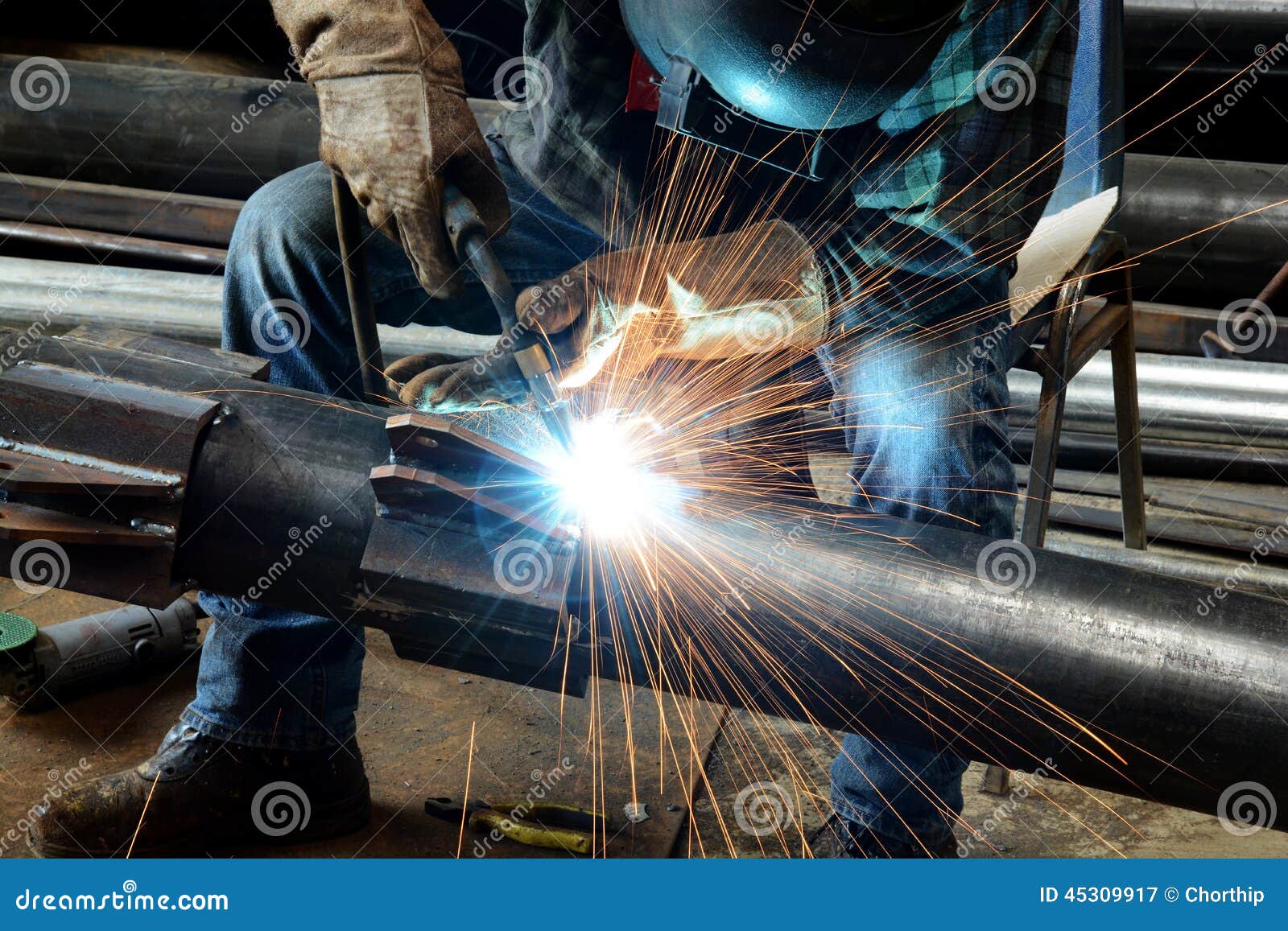 Welder at work stock image. Image of manufacturer, welder - 45309917