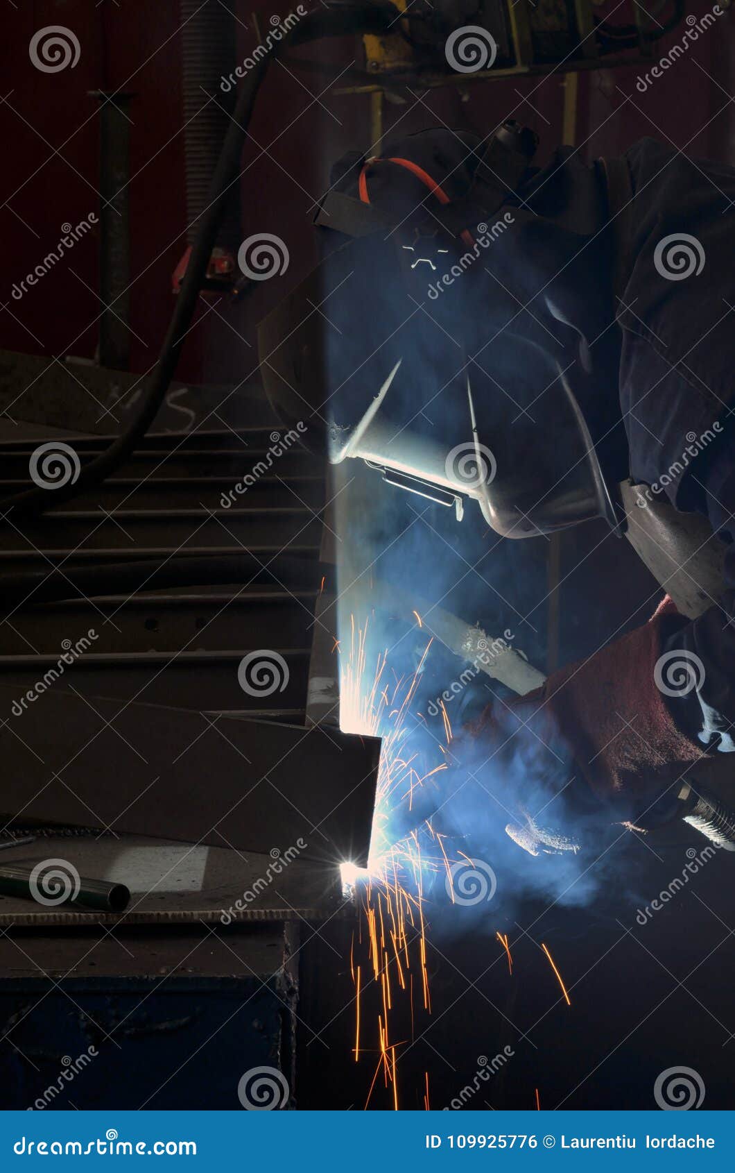 Welder and bright sparks stock photo. Image of safety - 109925776