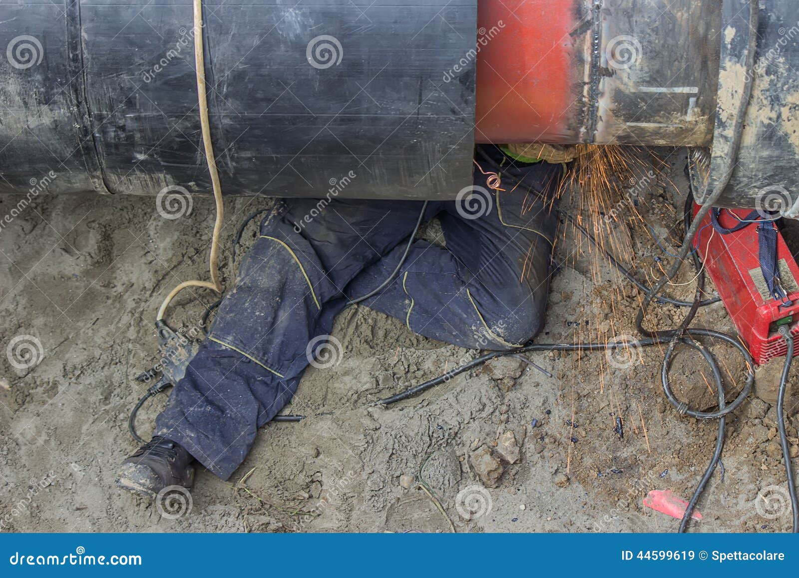 Welder Worker Grinding the Weld in Trench Under Pipeline Stock Image ...