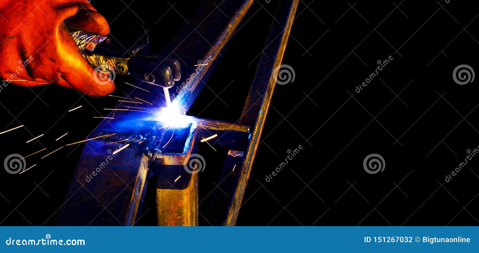 Welder Worker Performs Jump Welding. Man Welder in Protective Gloves ...