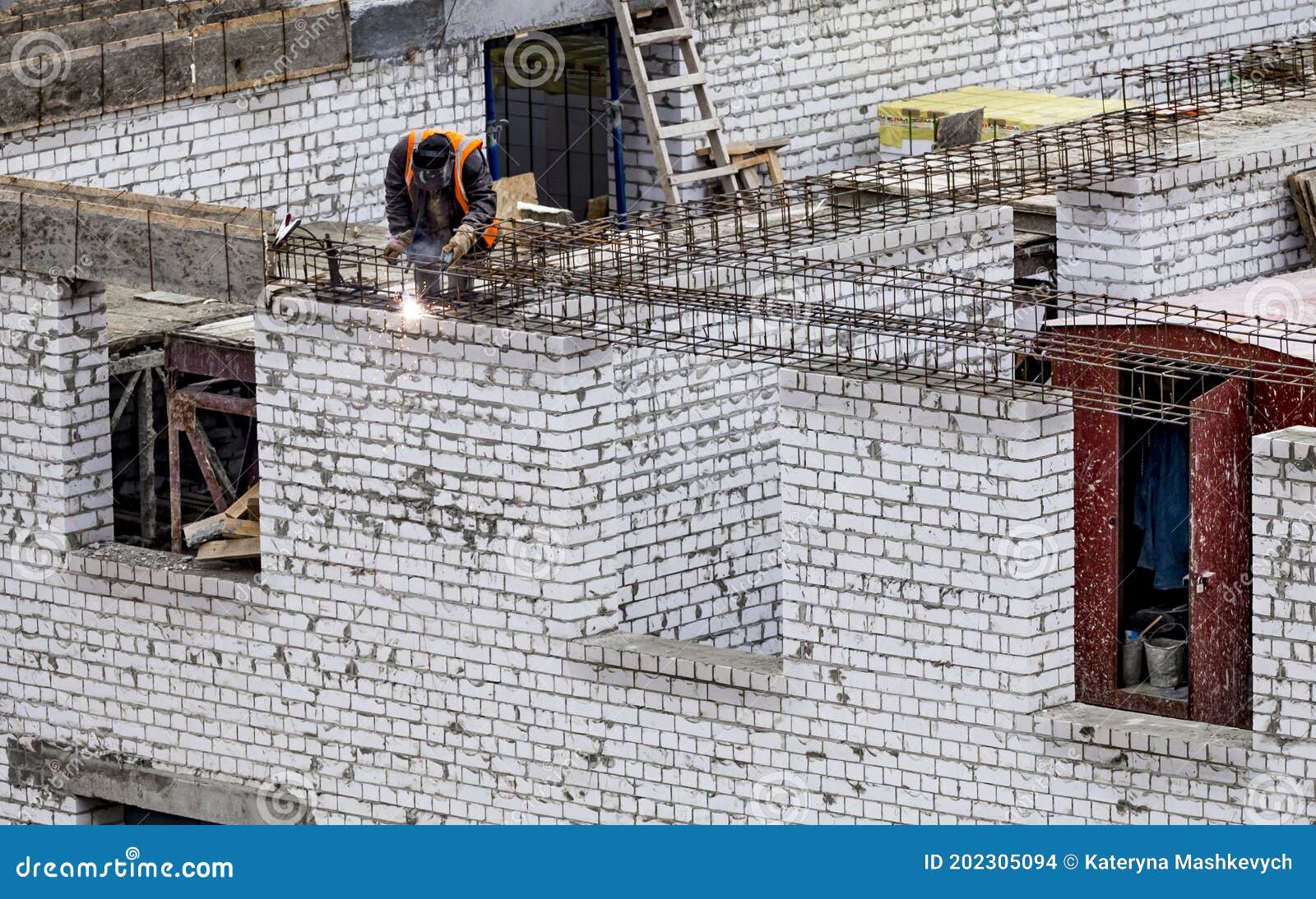 Welder Worker Welding Building Metal Iron Reinforcement Elements at the ...