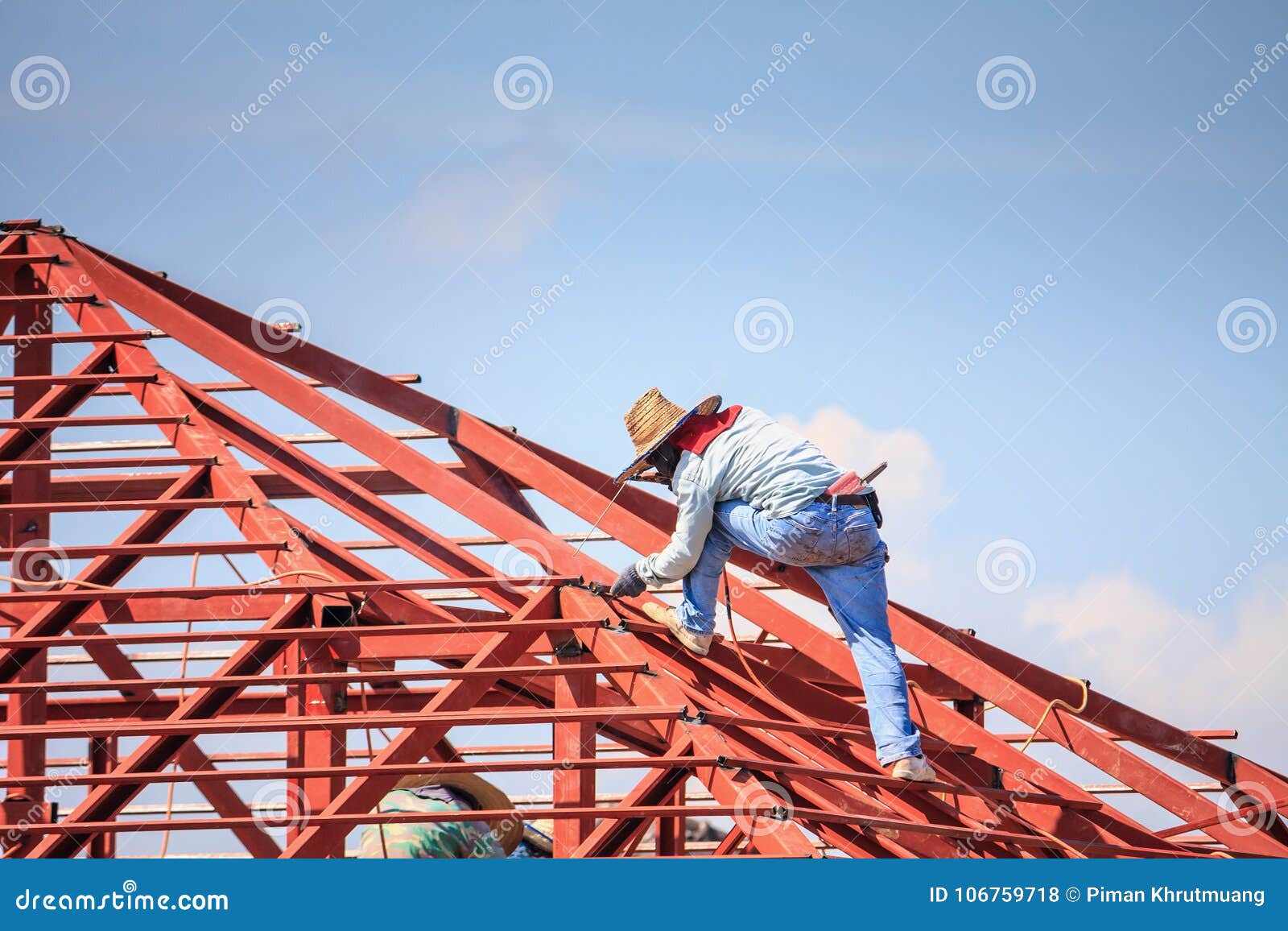 Welder Workers Installing Steel Frame Structure of the House Editorial ...