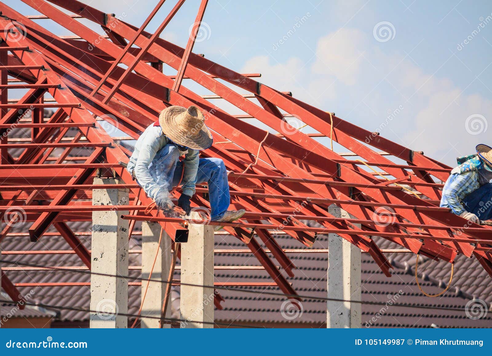 Welder Workers Installing Steel Frame Structure of the House Editorial ...
