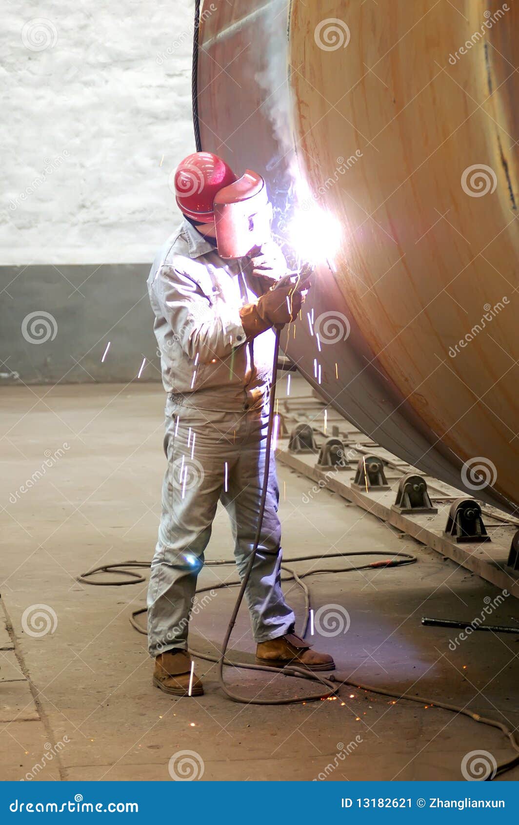A welder is working stock image. Image of indoors, employment - 13182621