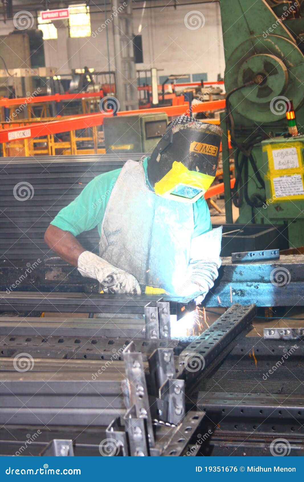 Welder Working in a Commercial Manufacturing Setup Stock Photo - Image ...