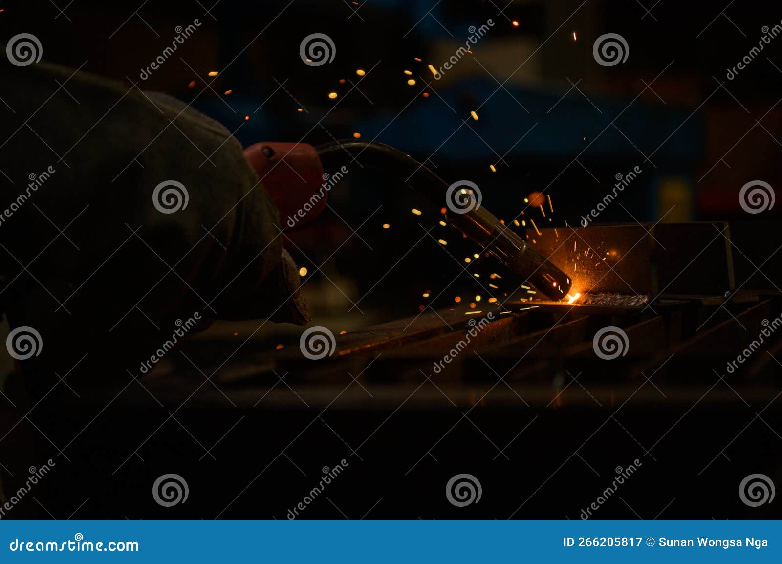 A Welder is Working To Weld Metal. To Create Quality Work According ...