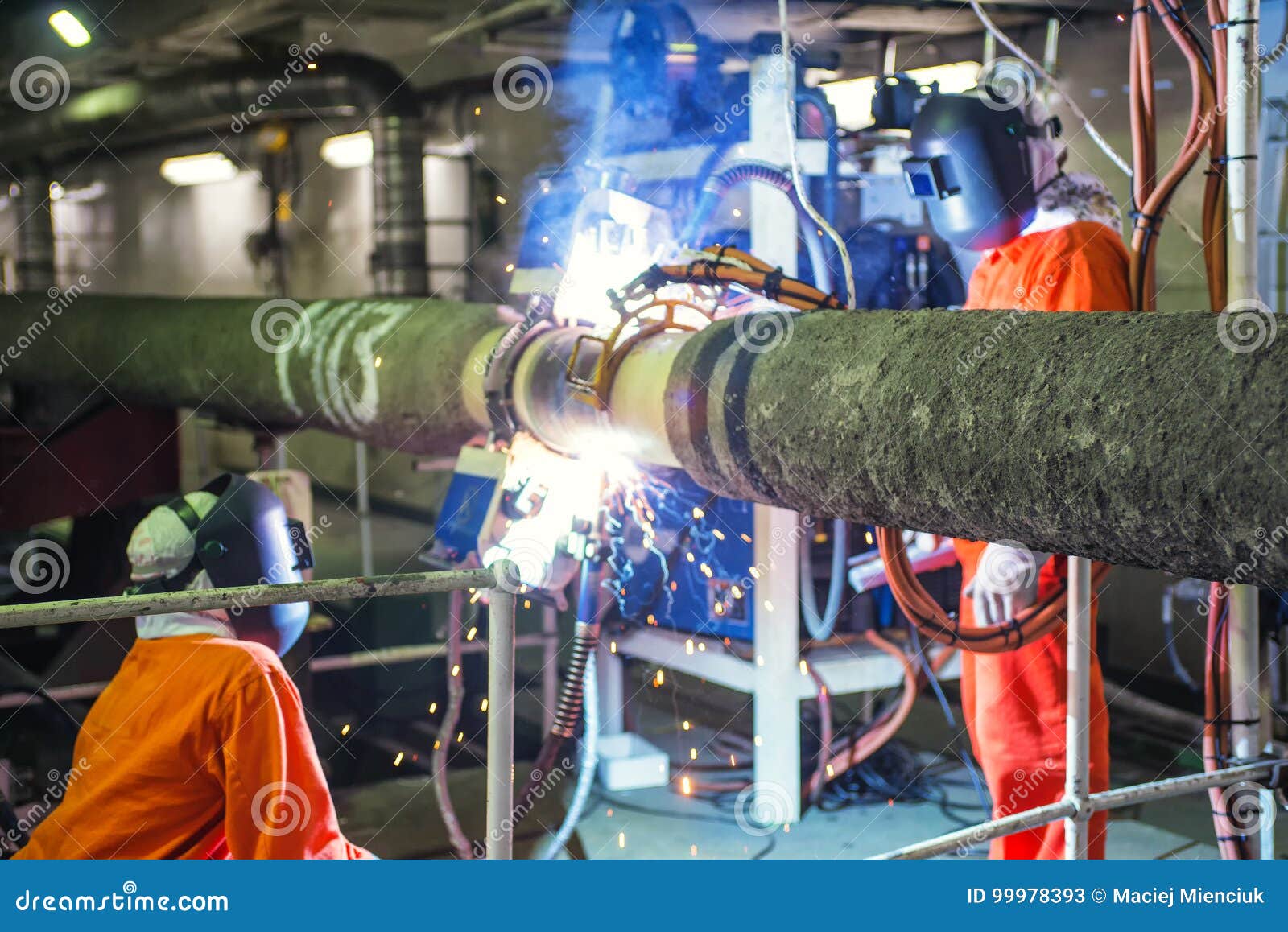 Welders welding pipes stock image. Image of repair, metal - 99978393