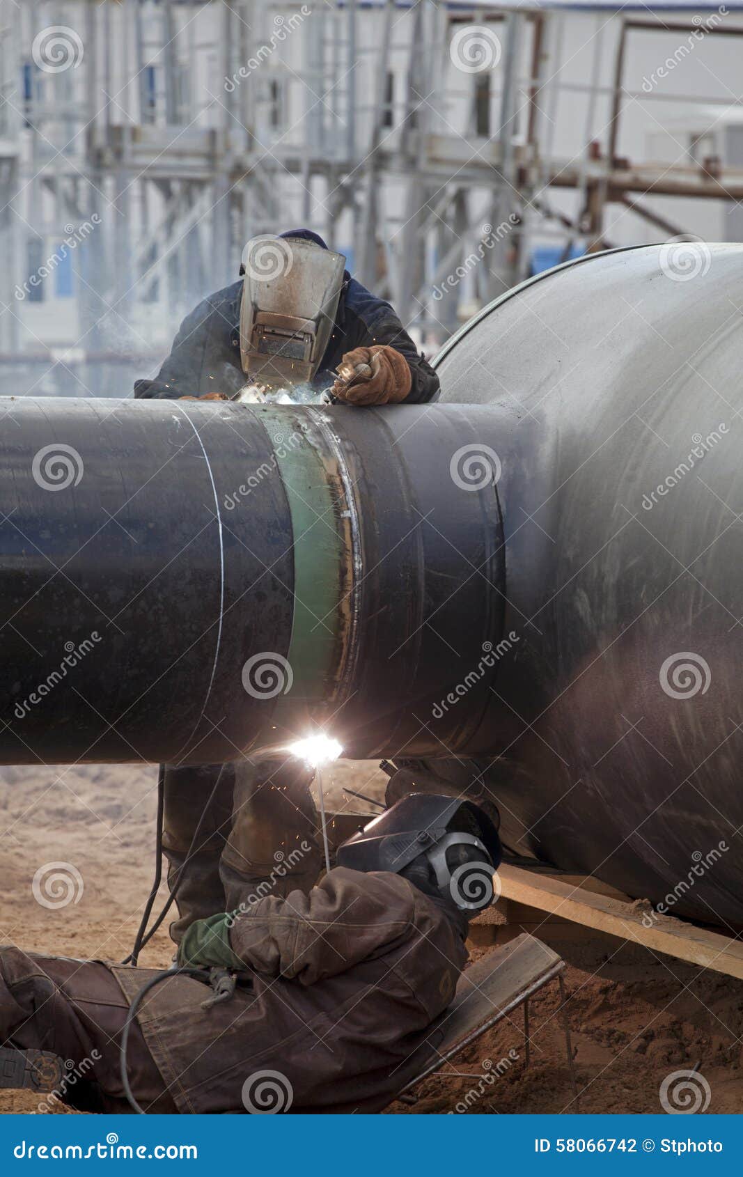 Welders stock photo. Image of pipeline, energy, safety - 58066742