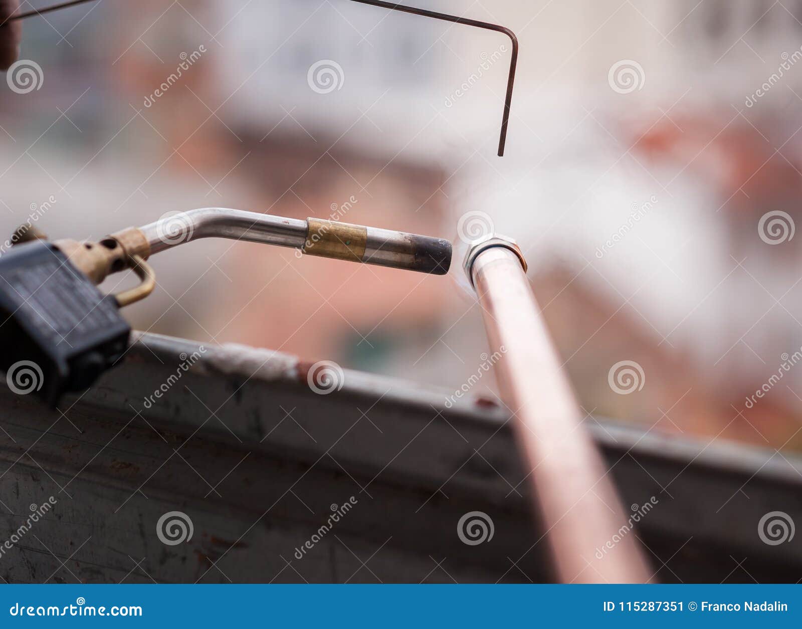 Welding of copper pipe. stock image. Image of elbow - 115287351