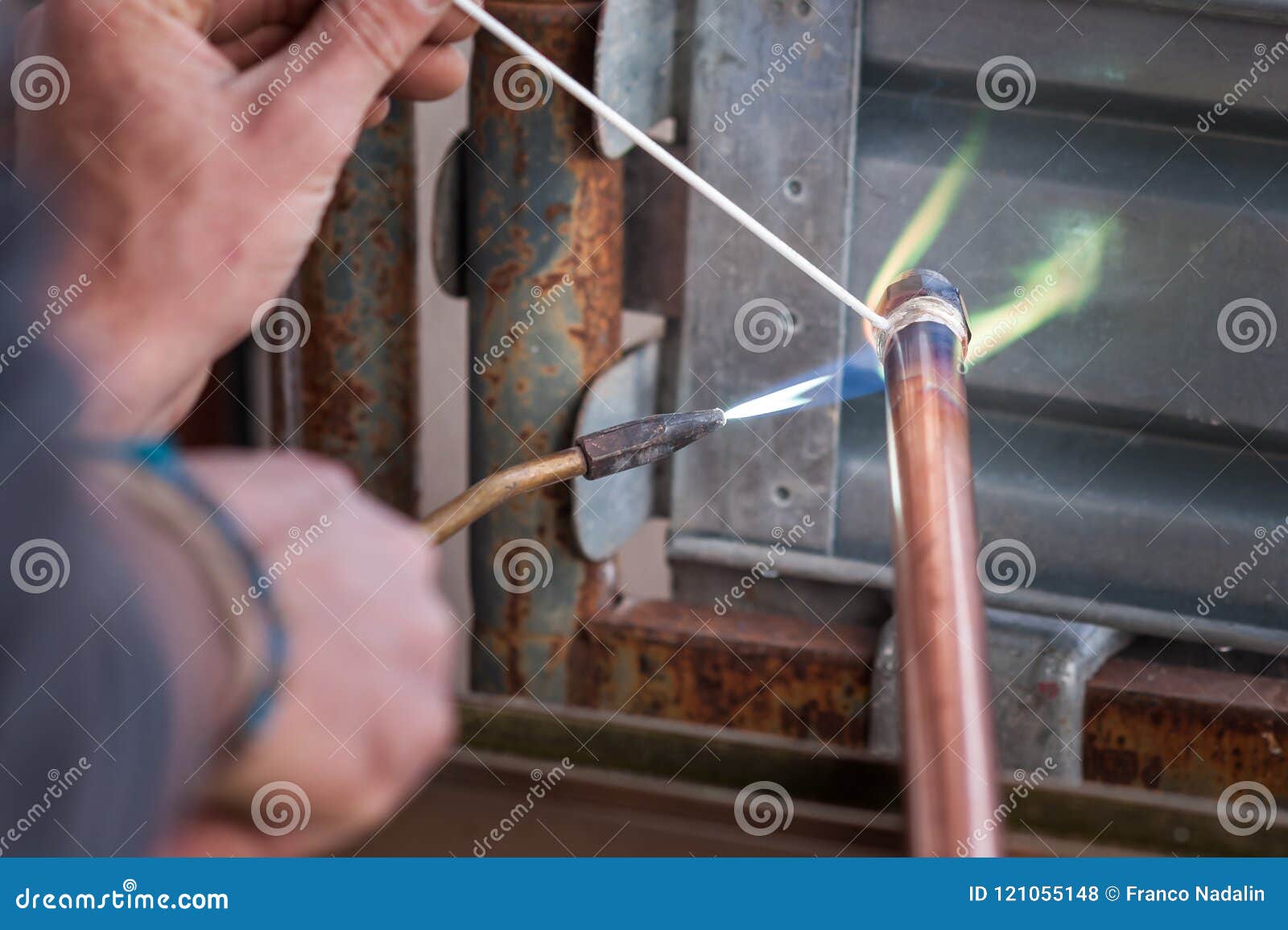 Welding of copper pipe. stock photo. Image of equipment - 121055148