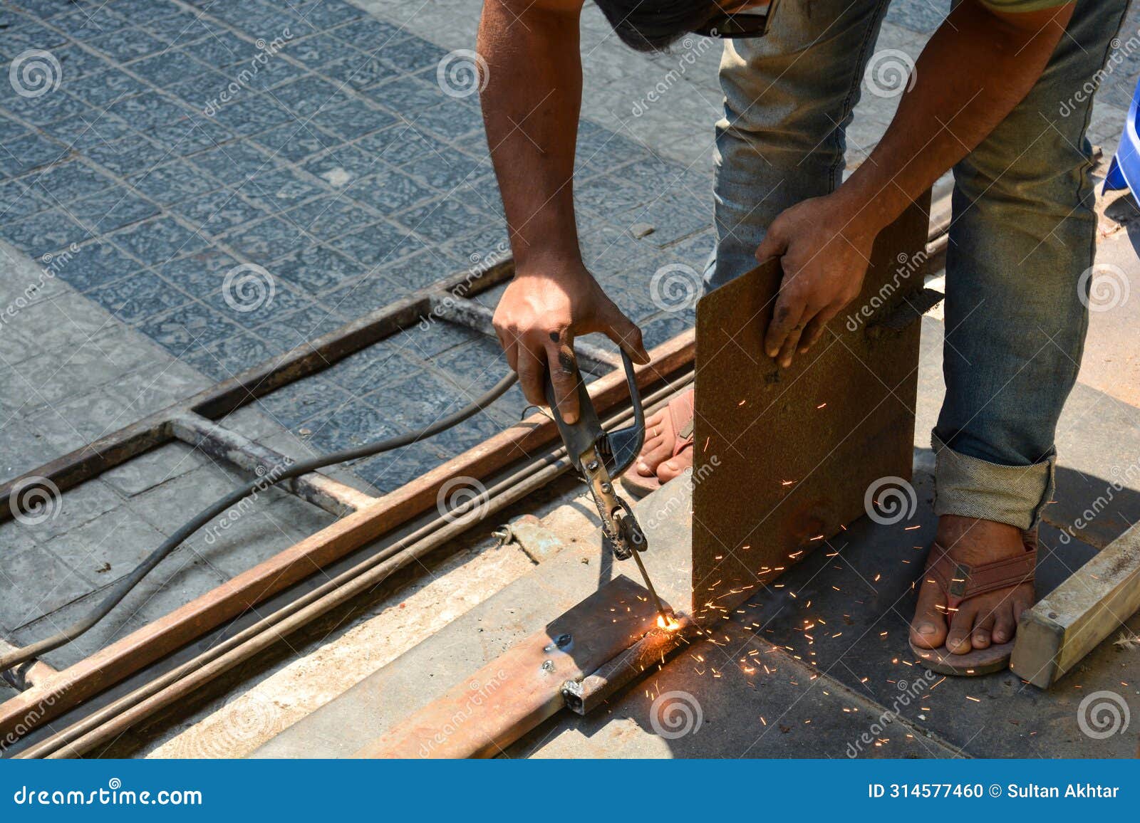Welding Job Works in the Rolling Shutter Factory Stock Photo - Image of ...