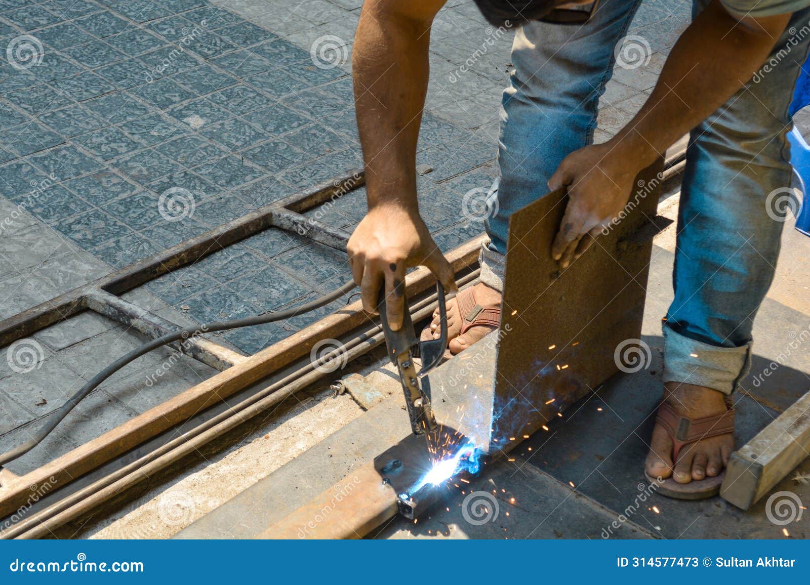 Welding Man at Work in the Rolling Shutter Factory Stock Image - Image ...
