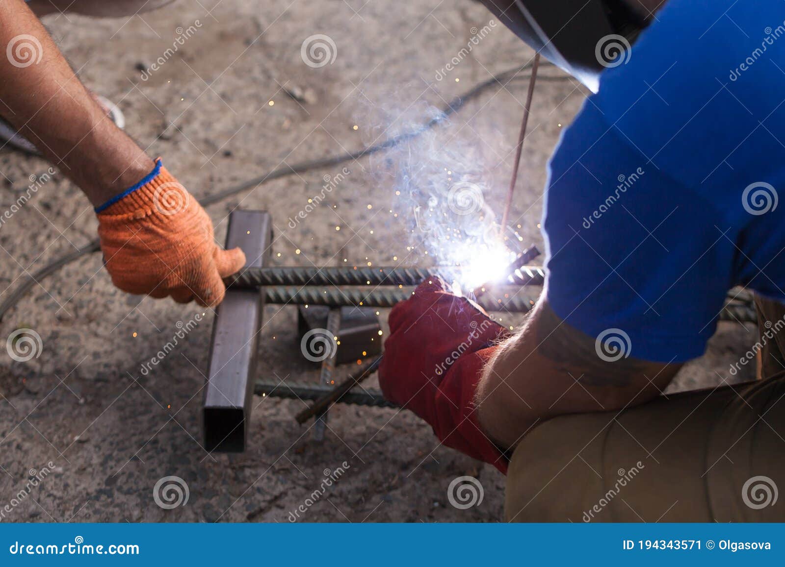 Welding of Metal Fittings by a Working Stock Image - Image of industry ...