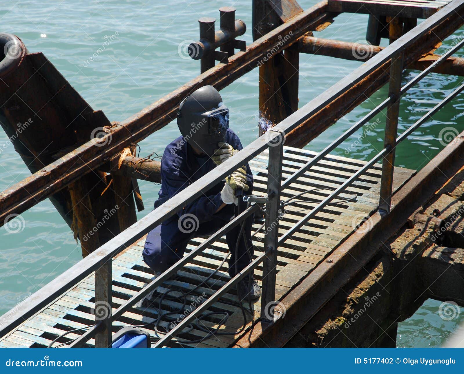 Welding Operator Near the Sea Stock Photo - Image of safety, fire: 5177402
