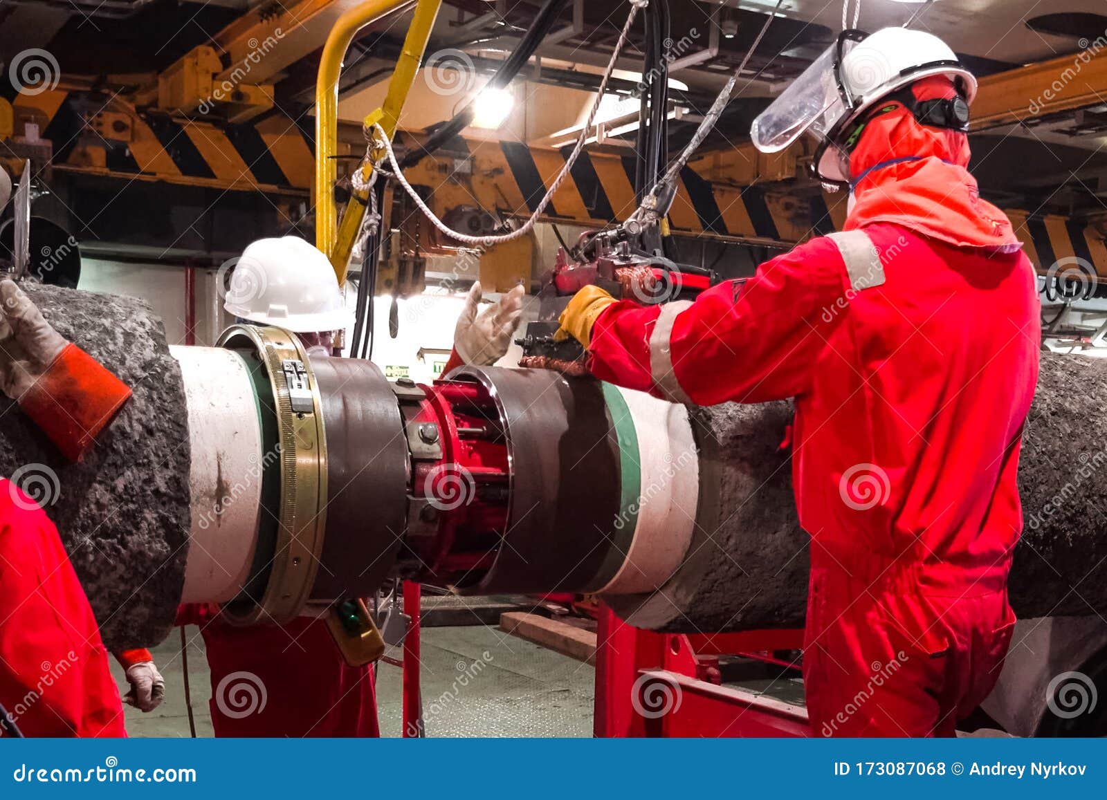 Welding the Pipeline for Laying on the Seabed. Work in a Pipe Layer ...