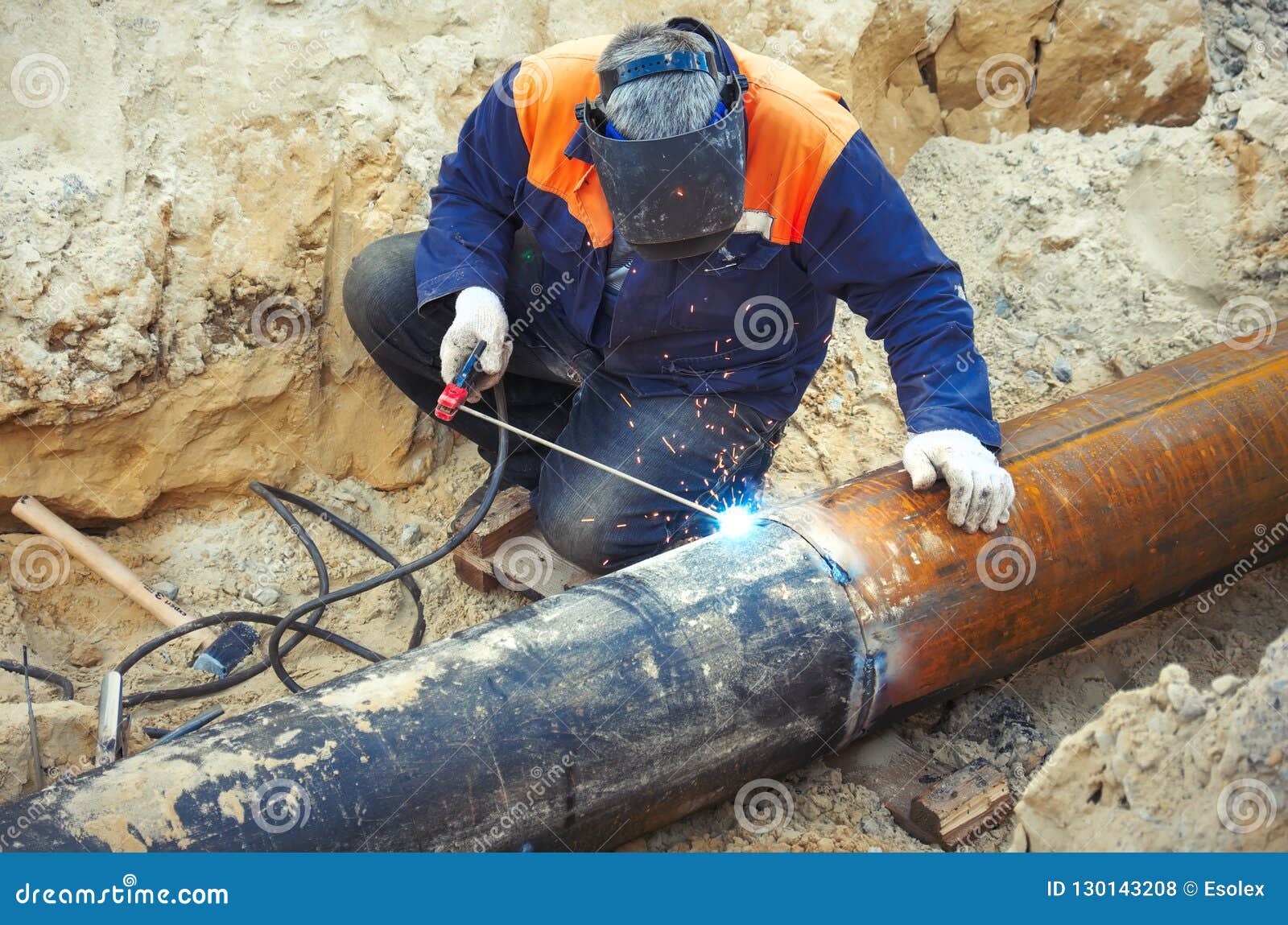 Welding of the pipeline. stock photo. Image of flame - 130143208