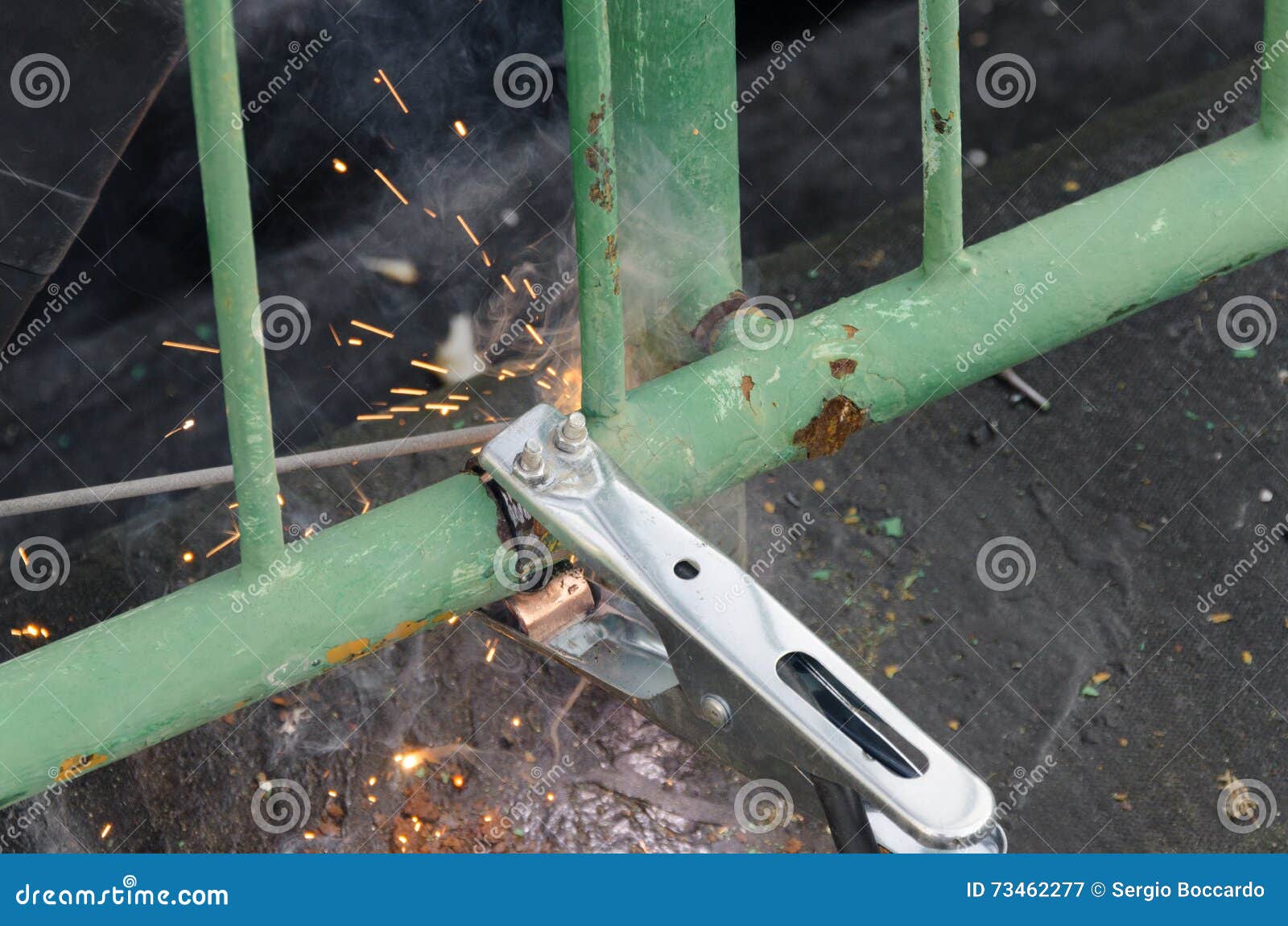 Welding of a railing stock image. Image of terminal, wood - 73462277