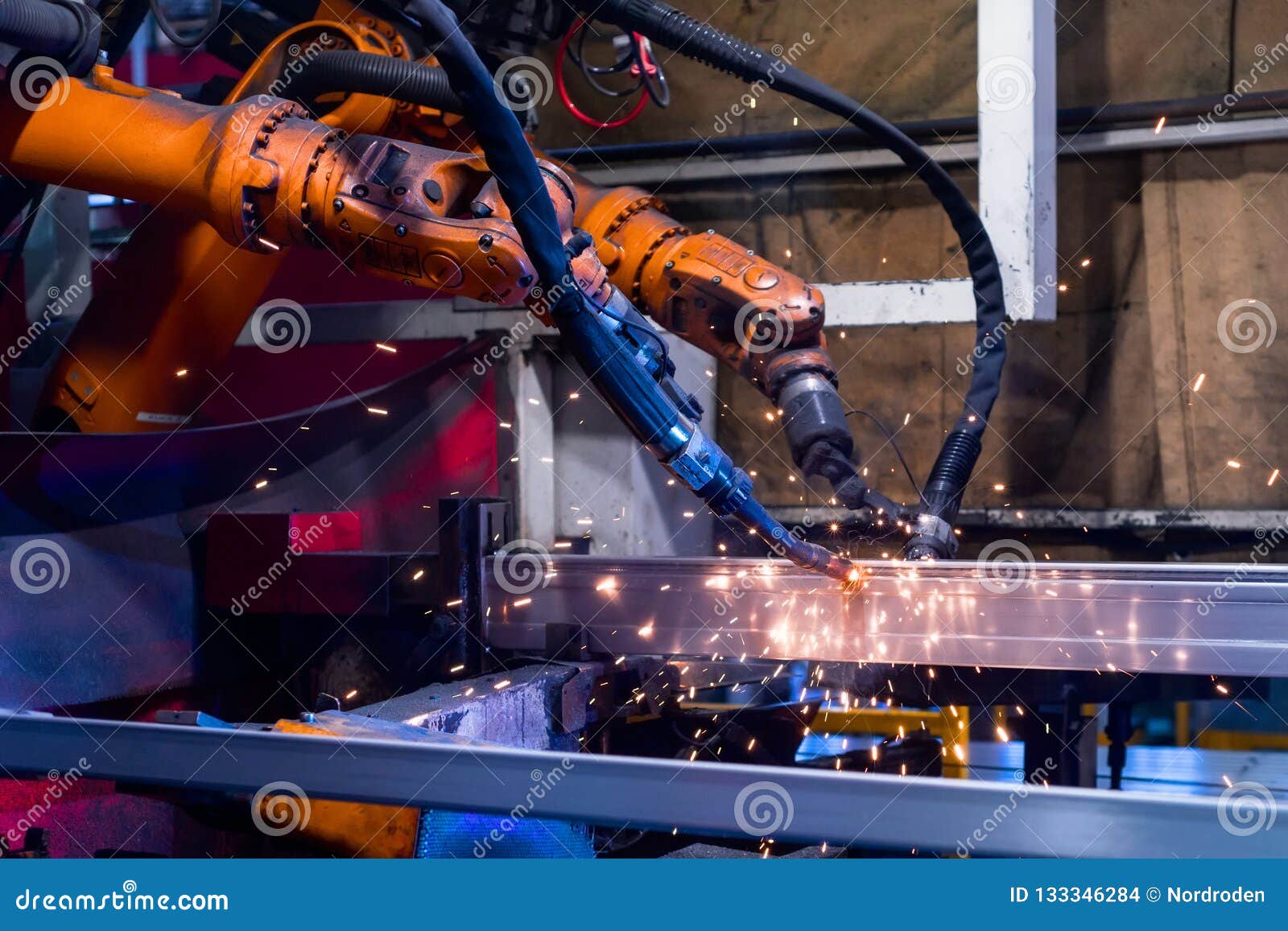 Welding Robot, the Process of Welding a Metal Profile. Stock Photo ...