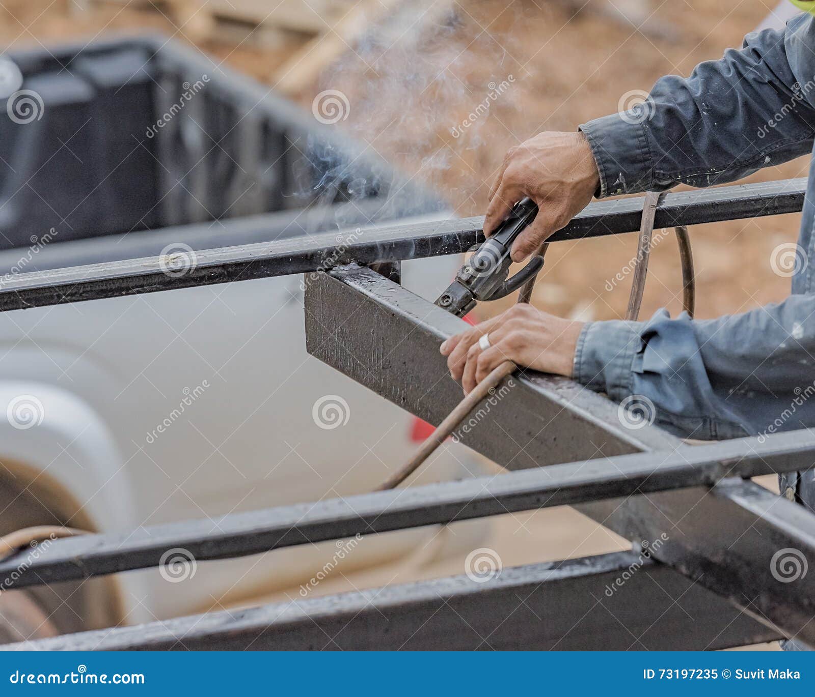 Welding on the roof stock image. Image of welding, skilled - 73197235