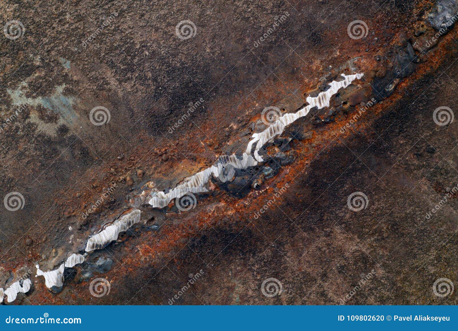 Welding on rusty metal. stock photo. Image of grunge - 109802620