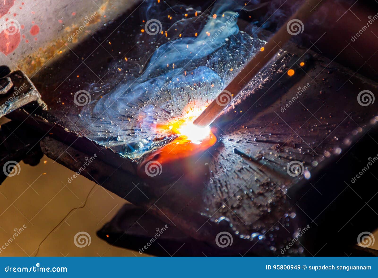 Welding stock image. Image of smoke, water, material - 95800949