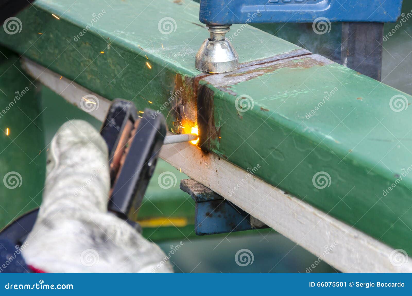 Welding a steel railing stock image. Image of railing - 66075501