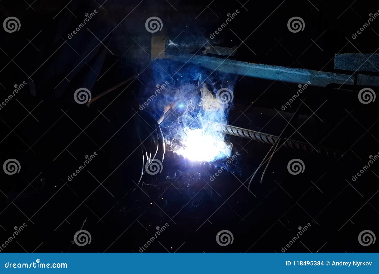 Welding of Steel Reinforcement. Sparks and Light from Welding Stock ...